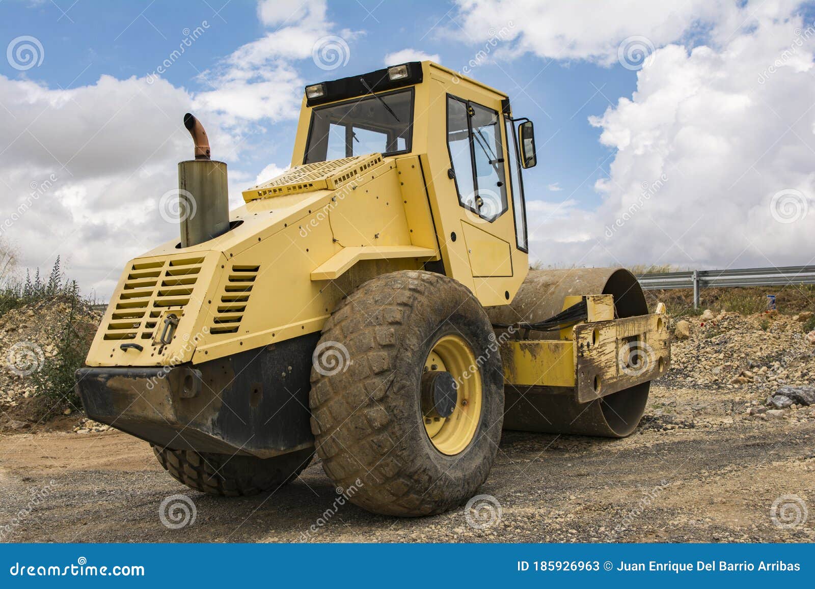 Yellow Steamroller Doing Road Construction Work Stock Image - Image of ...