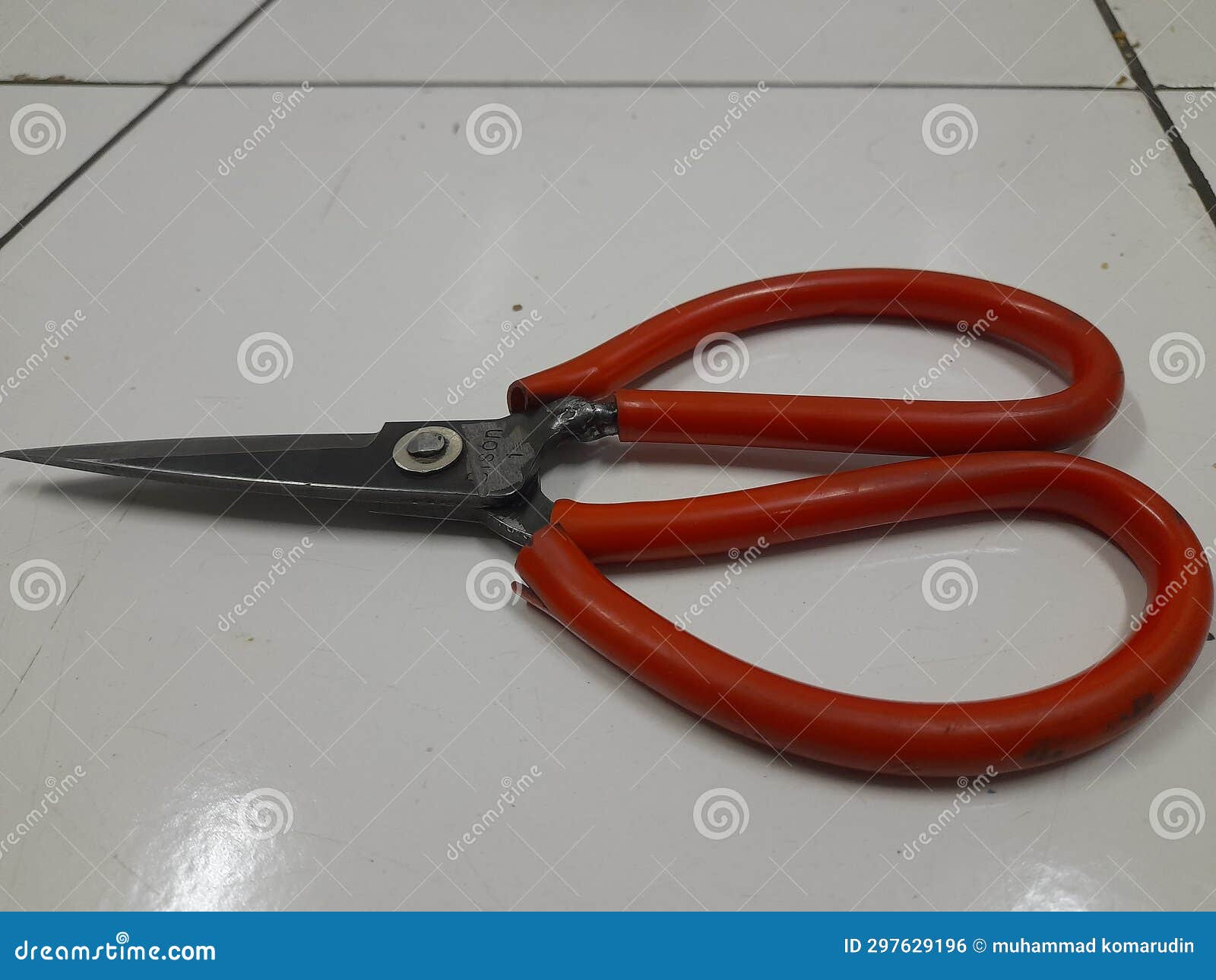 A Red-stemmed Iron Scissors Lay on the Floor Stock Photo - Image of ...