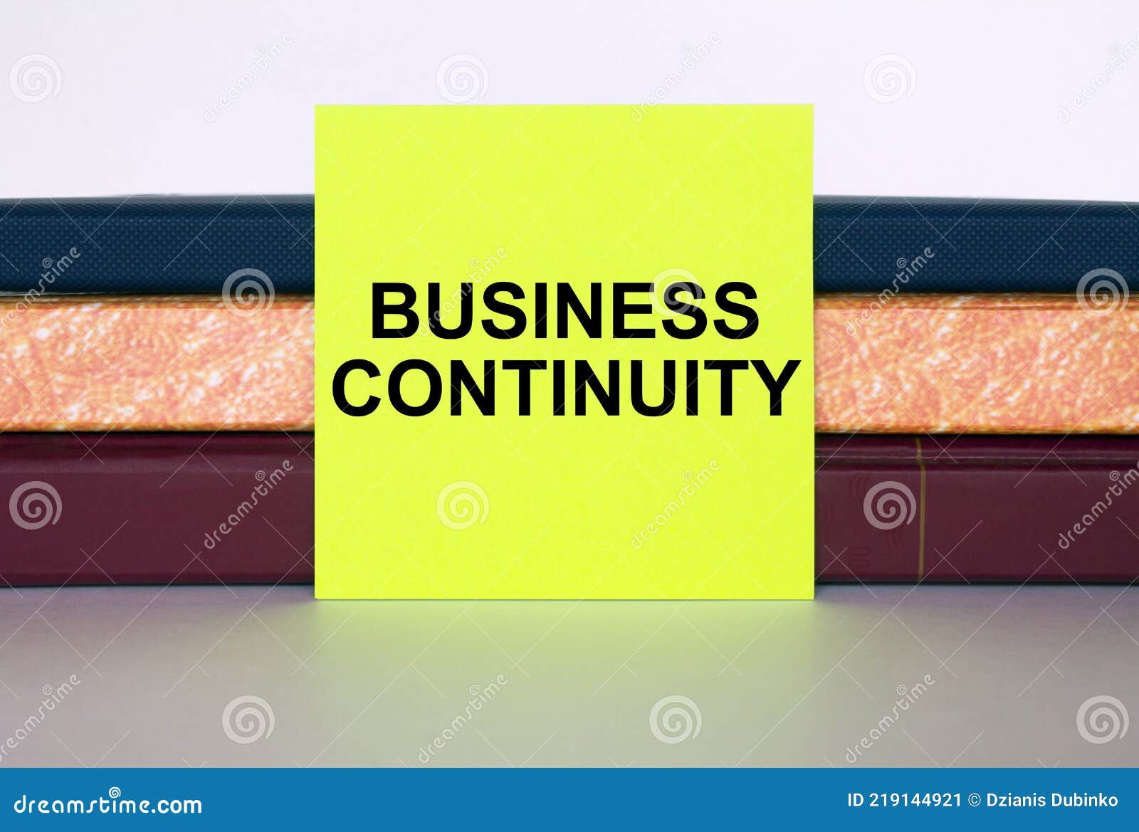 Yellow Sticker Question Mark with Text Business Continuity on a Stack ...