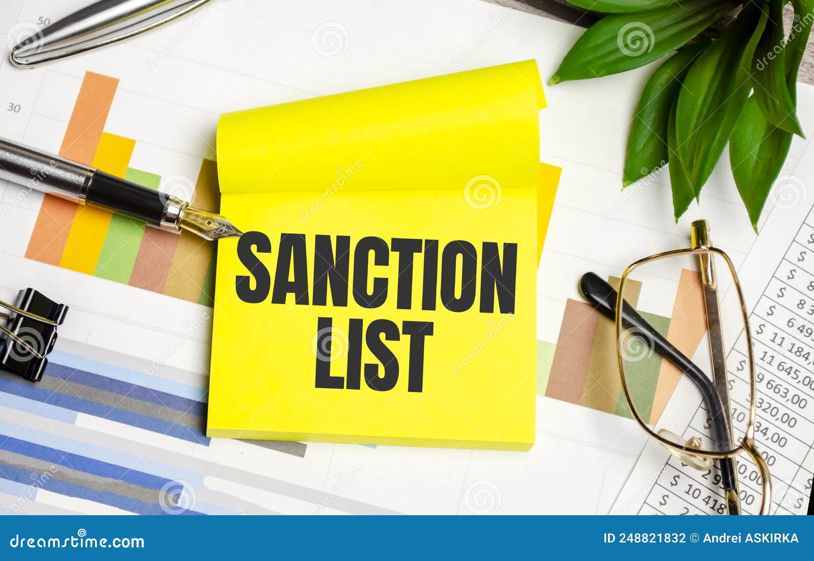 Yellow Sticker with the Text SANCTION LIST and Charts Stock Photo ...