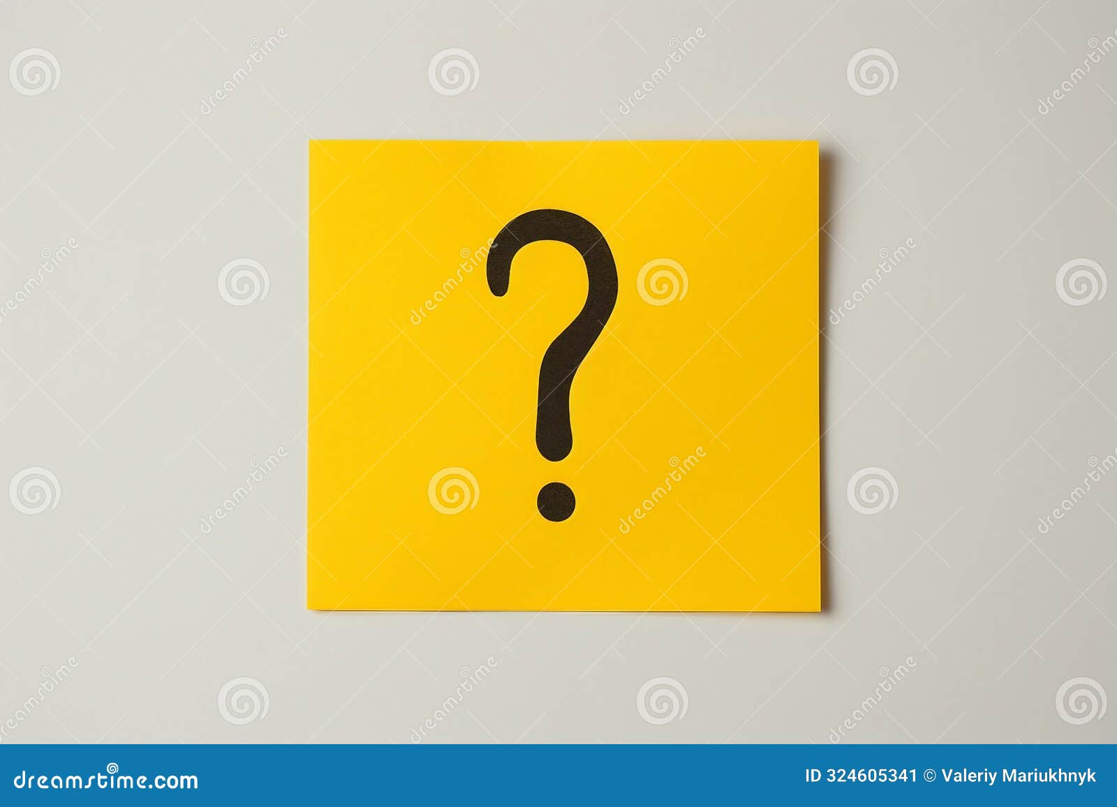 Yellow Sticky Note with a Black Question Mark Symbol on a Plain ...