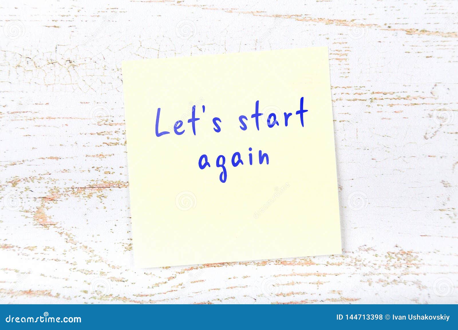 Yellow Sticky Note with Handwritten Text Lets Start Again Stock ...