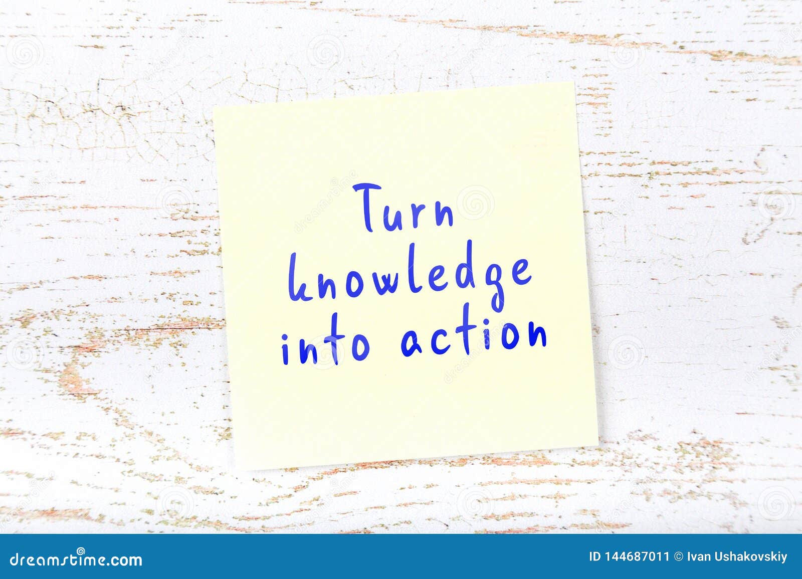 Yellow Sticky Note with Handwritten Text Turn Knowledge into Action ...