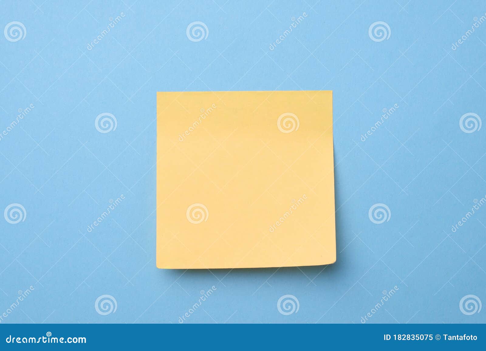 Yellow Sticky Note on Light Blue Background Stock Image - Image of ...