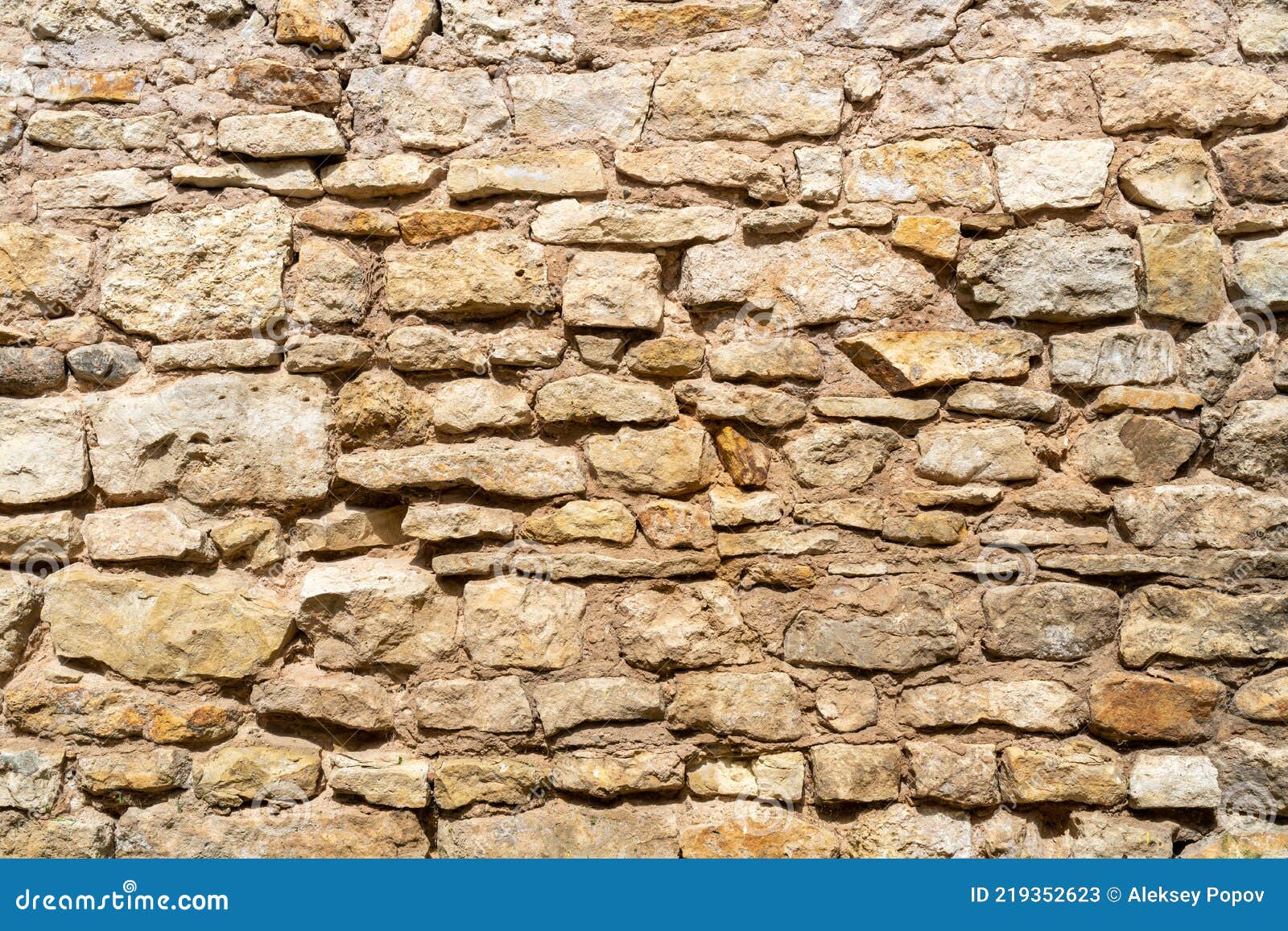 Yellow Stone Wall. Texture of a Stone Wall Stock Image - Image of ...
