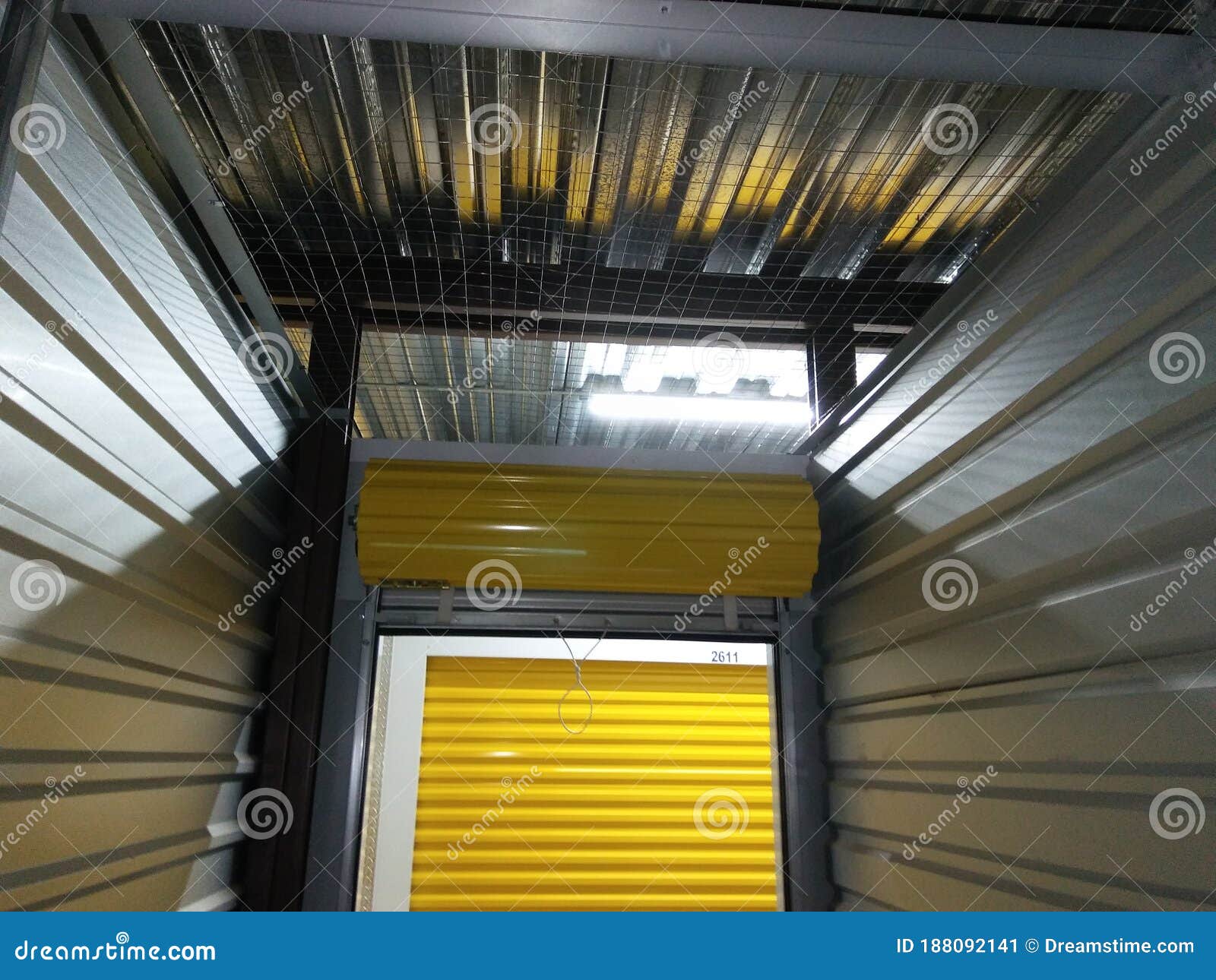 Yellow Storage Unit Facility Doors Rolled Up from the Inside Stock ...