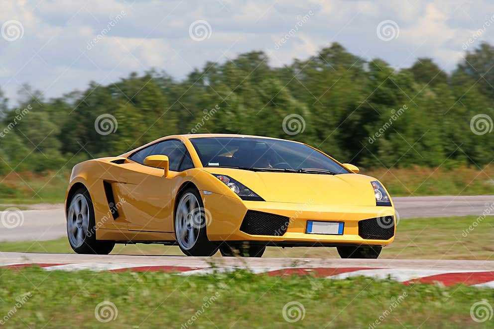 Yellow supercar stock photo. Image of circuit, auto, sportscar - 5436800