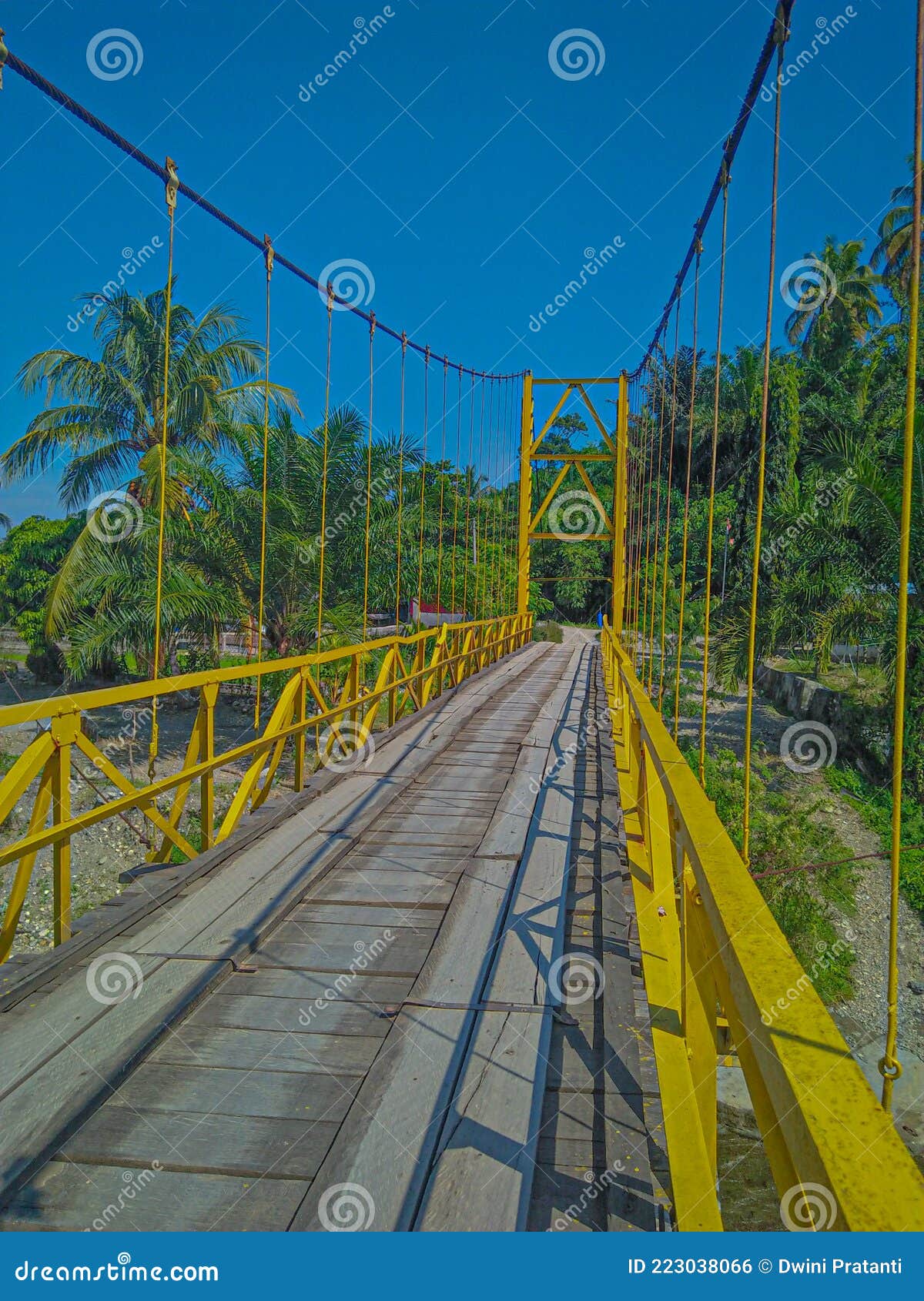 Yellow suspension bridge stock photo. Image of yellow - 223038066