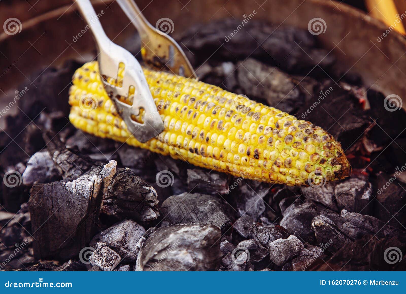 Yellow Sweet Corn Roasted on Fire from Black Carbons Stock Photo ...