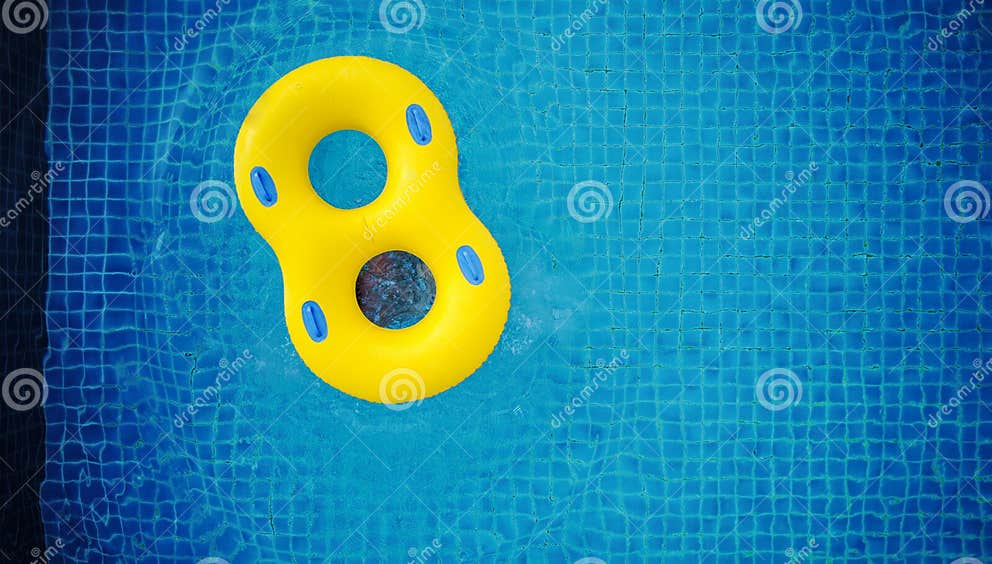 Yellow Swim Float, Floating on Swimming Pool Stock Photo - Image of ...