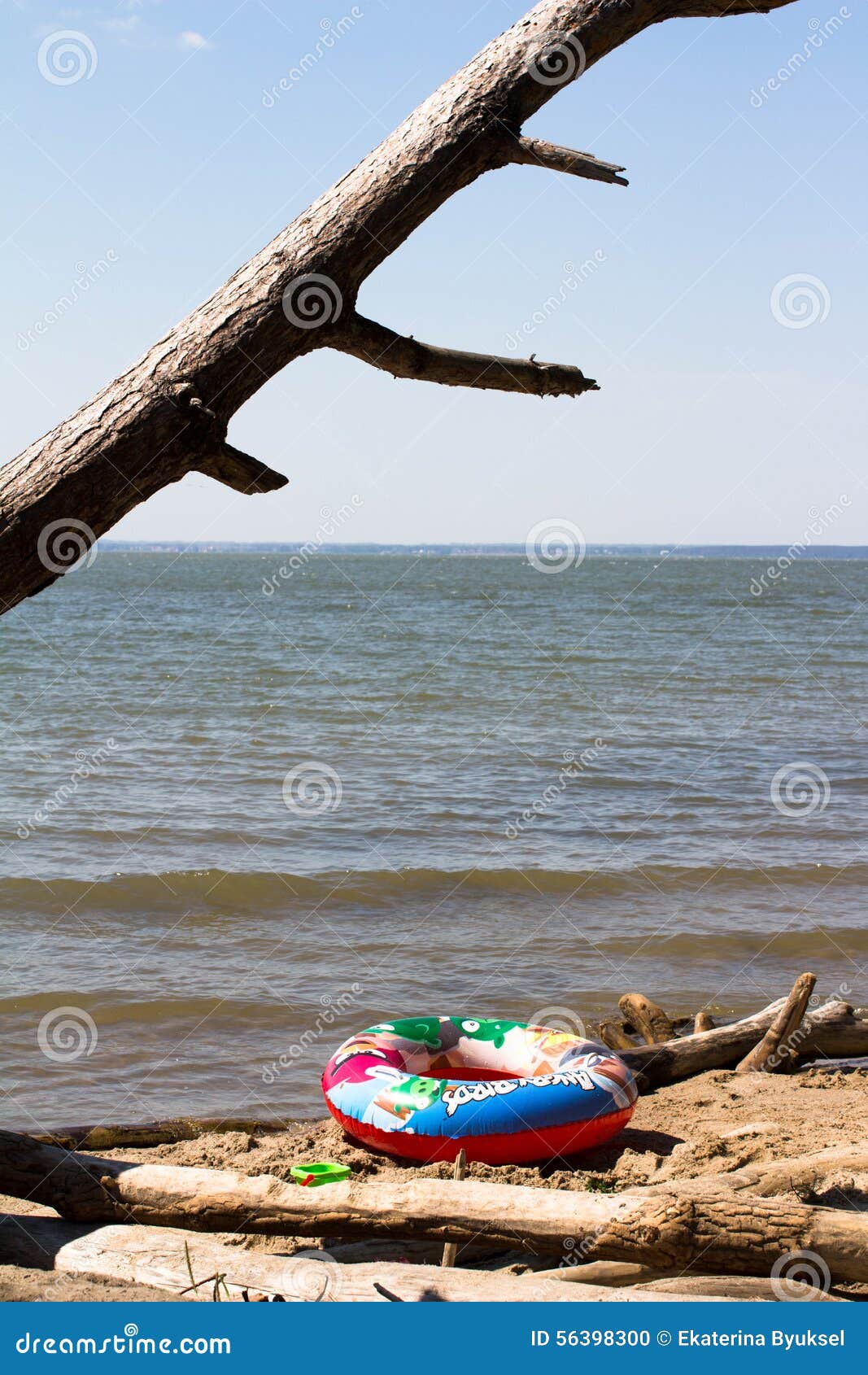 Yellow Swim Ring Floating on a Sea Stock Photo - Image of circle, color ...