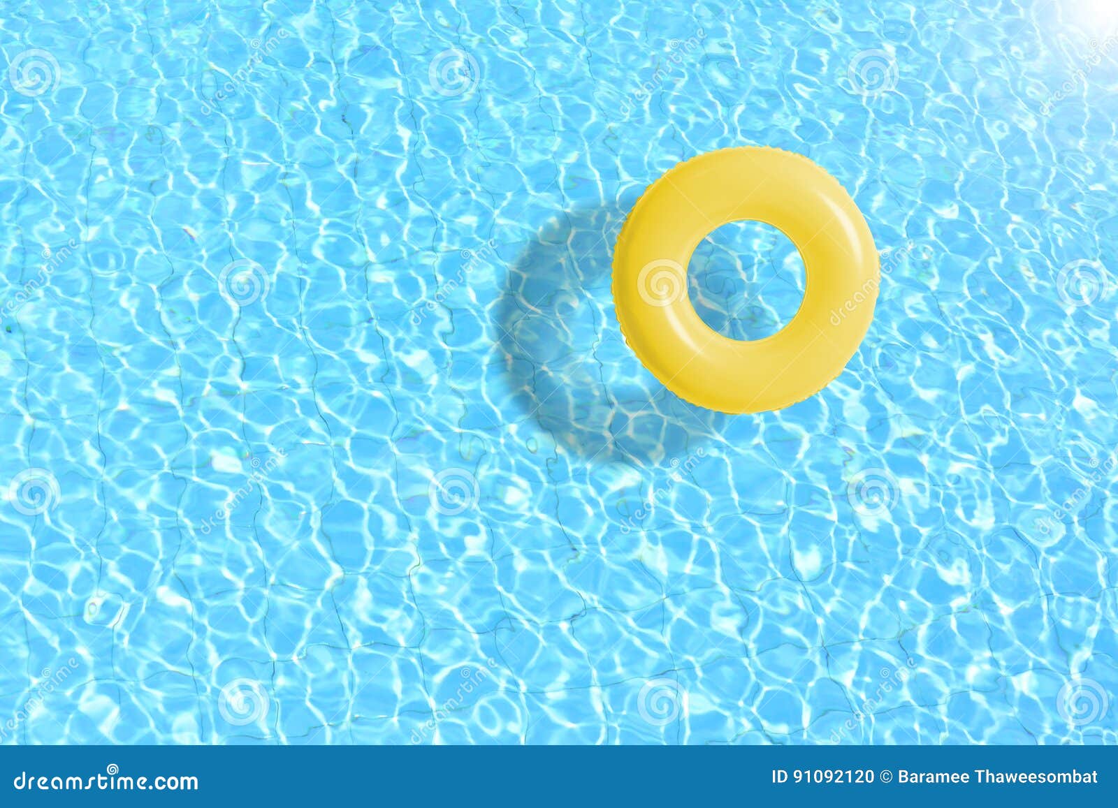 Yellow Swimming Pool Ring Float in Blue Water. Stock Photo - Image of ...