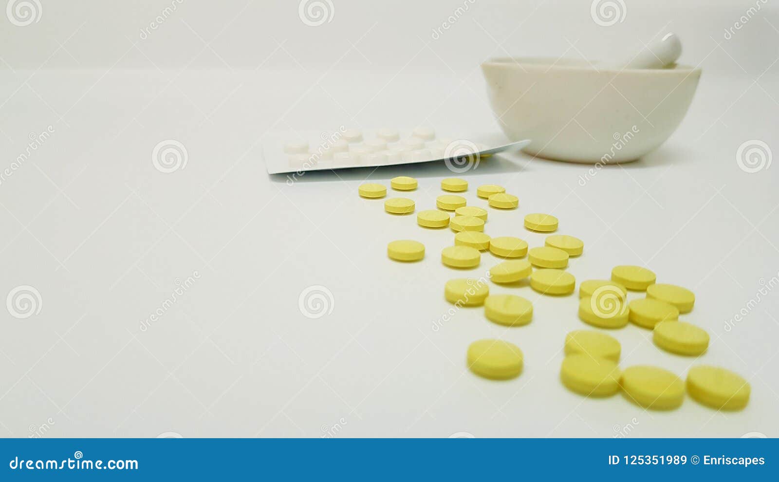 Yellow tablets compounding stock image. Image of mortar - 125351989