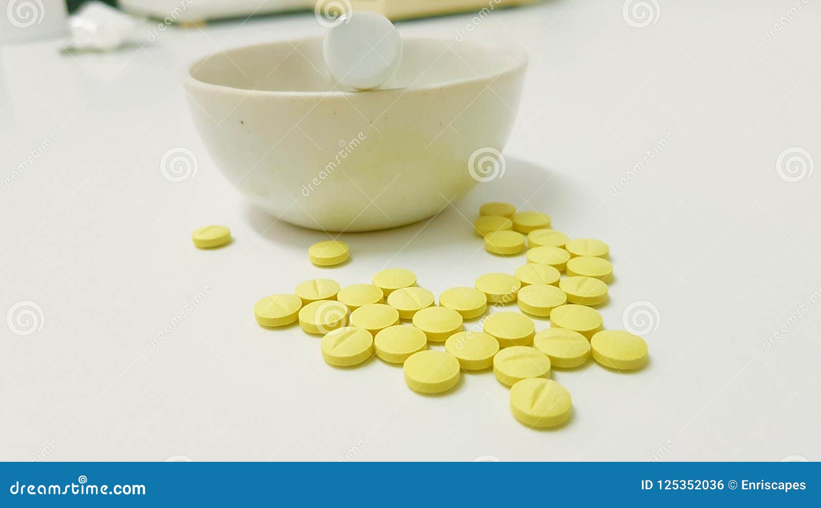 Yellow tablets compounding stock photo. Image of mortar - 125352036