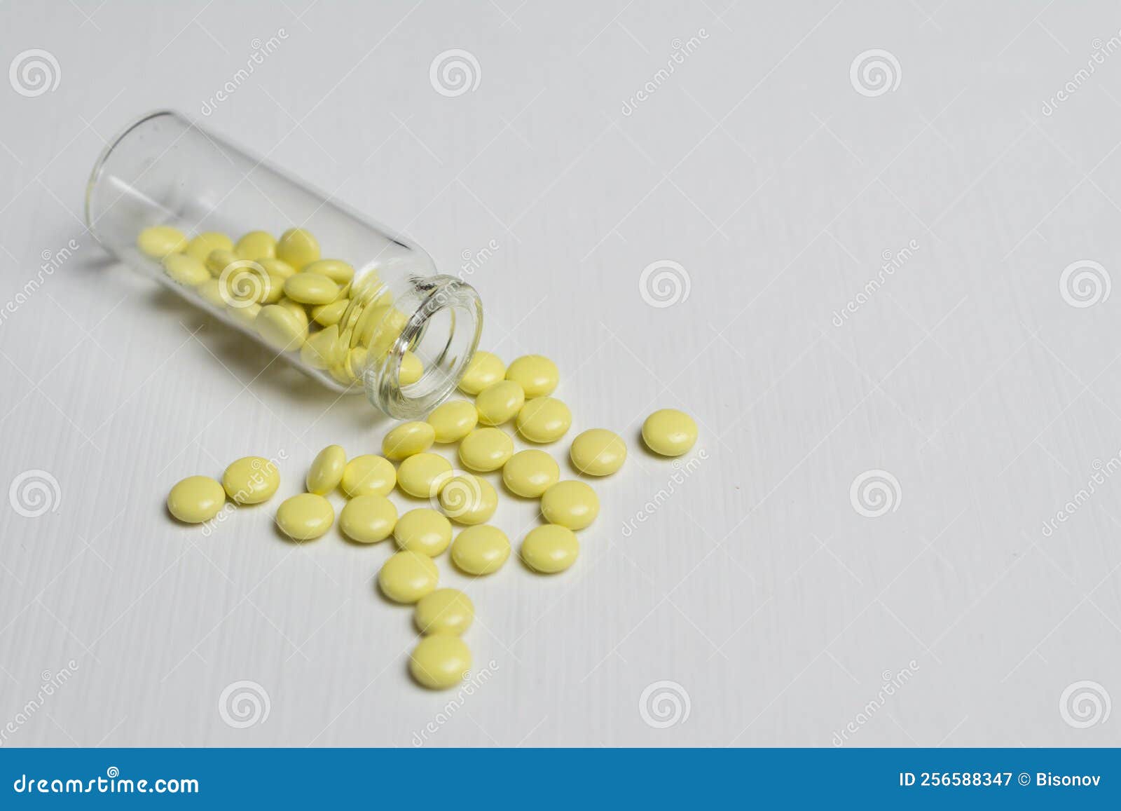Yellow Tablets on a White Table Stock Image - Image of pharmacy ...