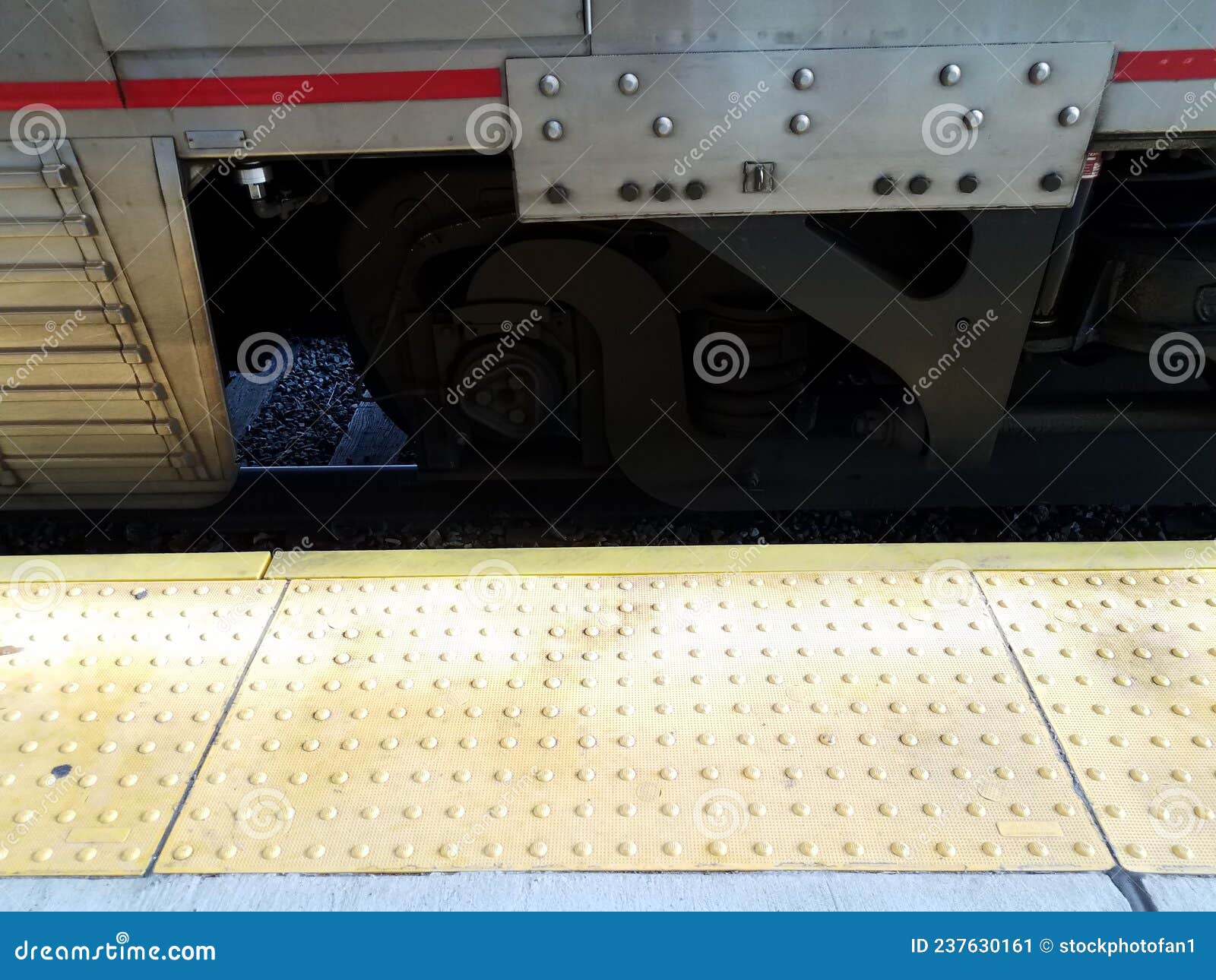 Yellow Tactile Bumps on Ground Near Train Stock Image - Image of ground ...