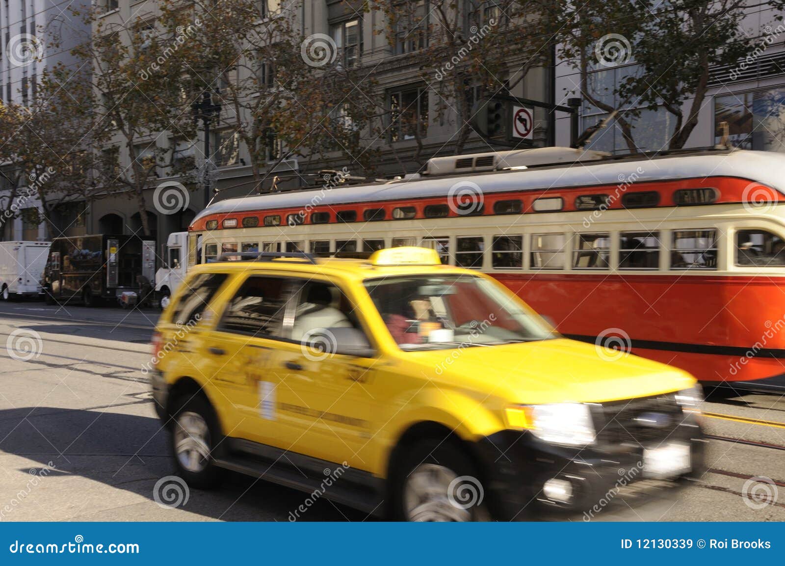 Yellow taxi and tram train stock image. Image of street - 12130339