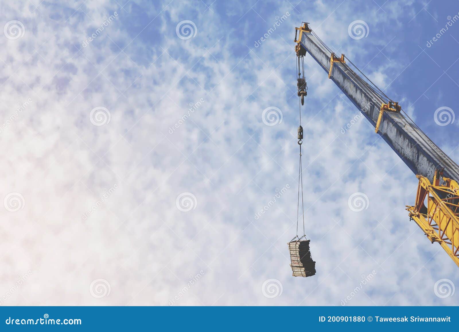 Yellow Telescopic Arm of a Mobile Crane Operating at a Construction ...