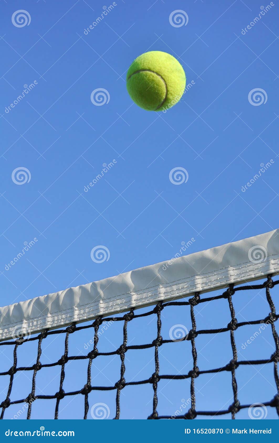 Yellow Tennis Ball Flying Over the Net Stock Photo - Image of tennis ...