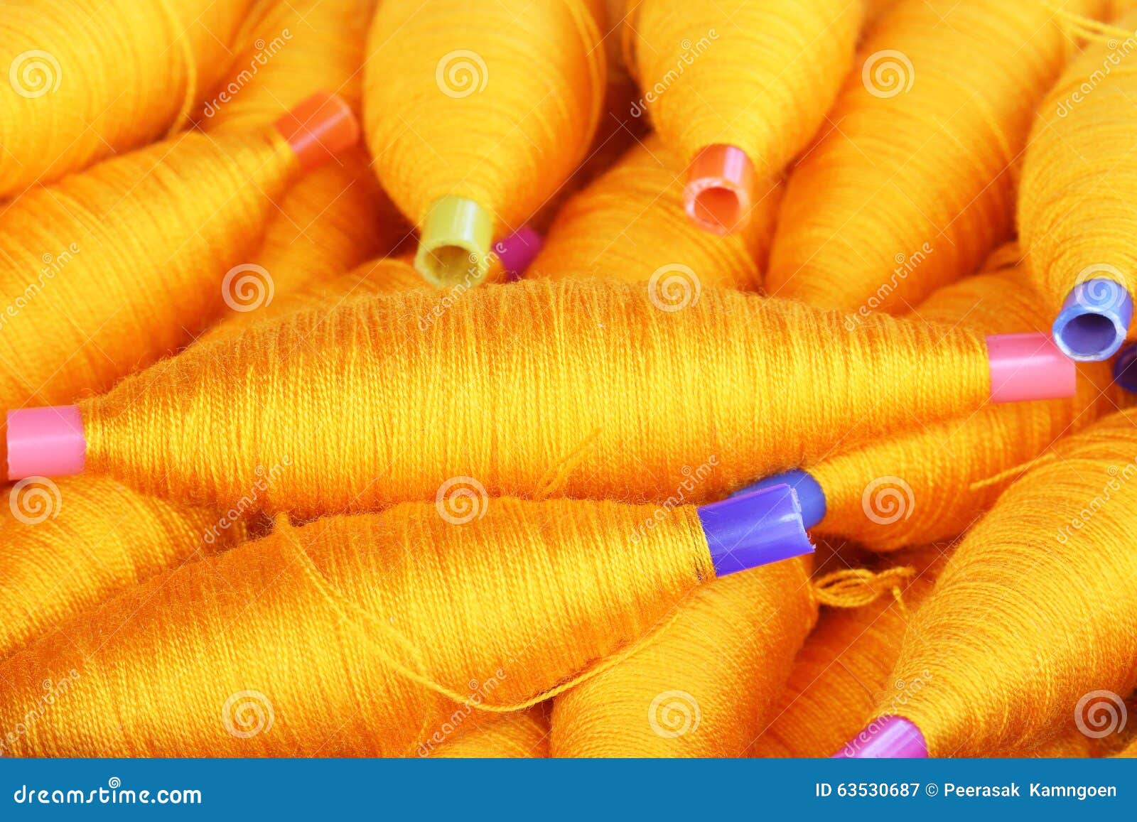 Yellow Thread Spool Background Stock Image - Image of stitch, clothing ...