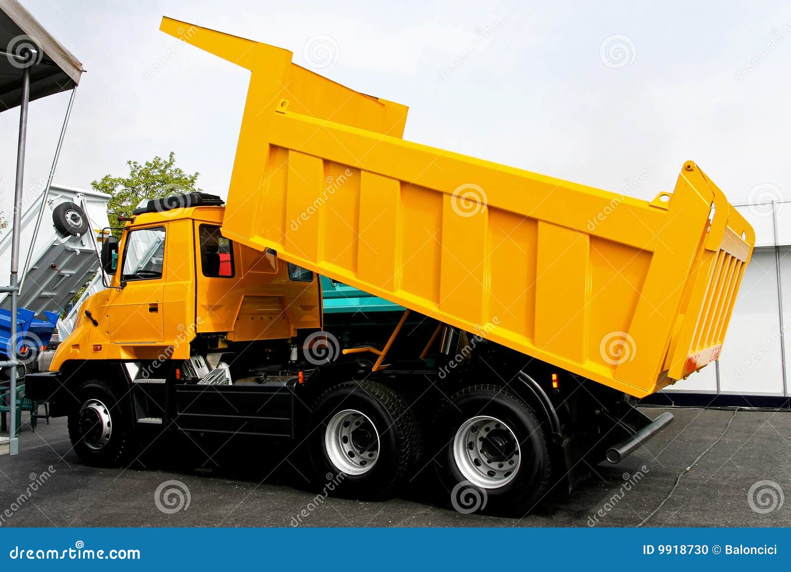 Yellow tipper stock photo. Image of industrial, vehicle - 9918730
