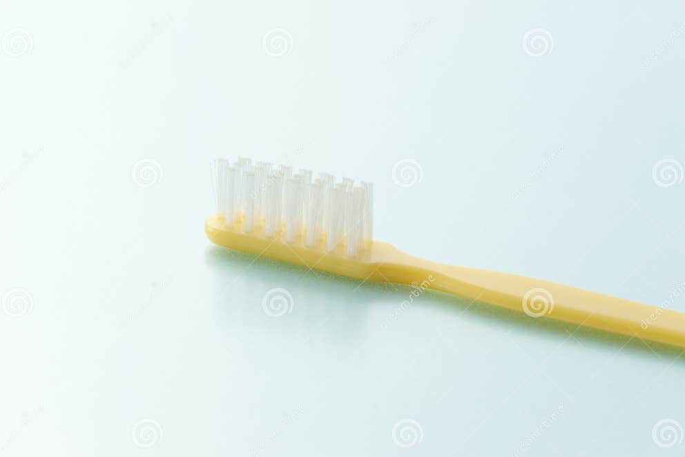 Yellow toothbrush stock photo. Image of health, brush - 24936404