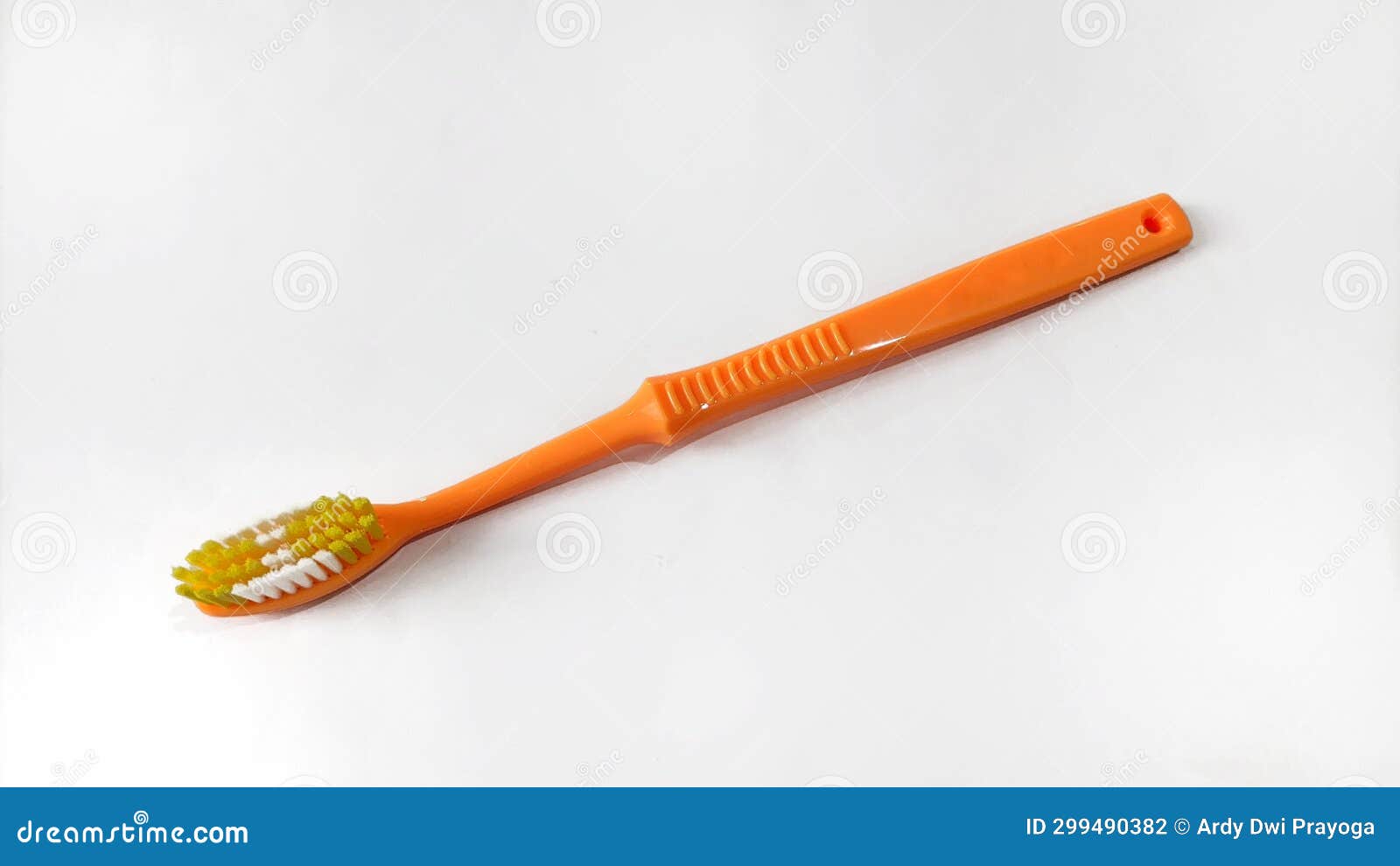 Yellow toothbrush. stock photo. Image of bathroom, morning - 299490382