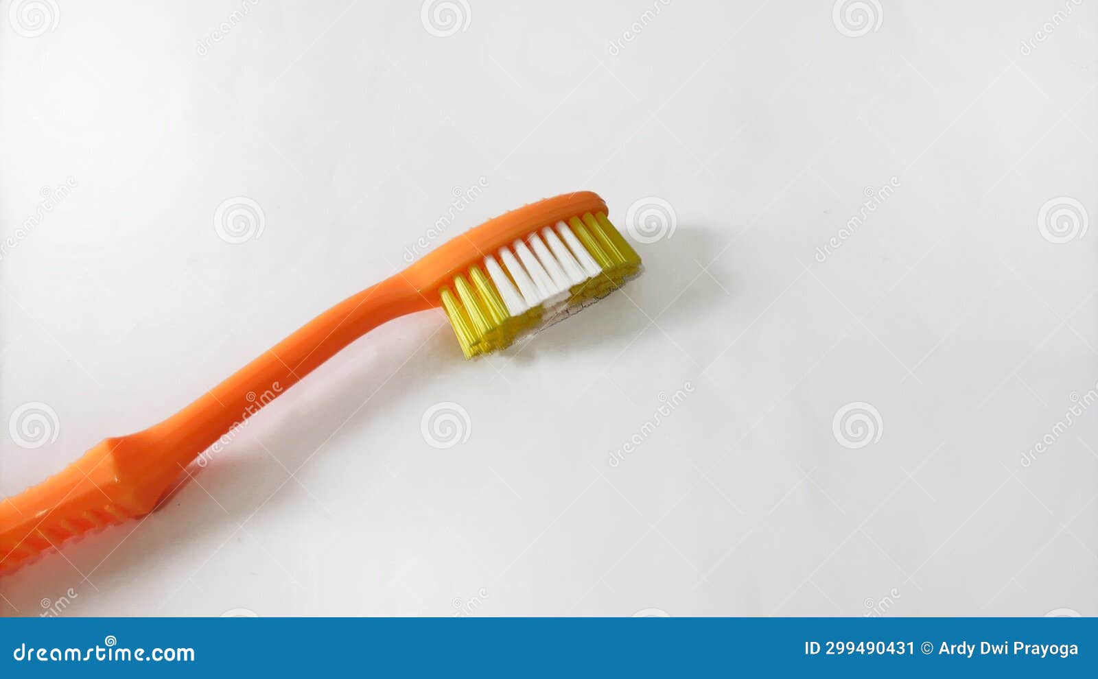 Yellow toothbrush. stock image. Image of clean, clear - 299490431