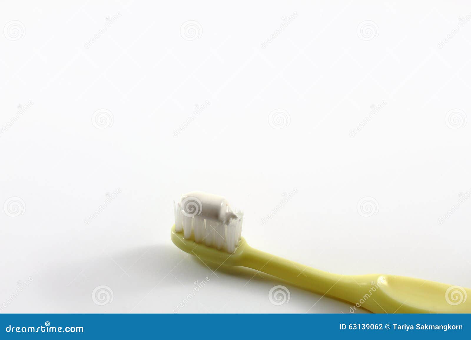 A Yellow Toothbrush with Toothpaste Stock Photo - Image of healthcare ...
