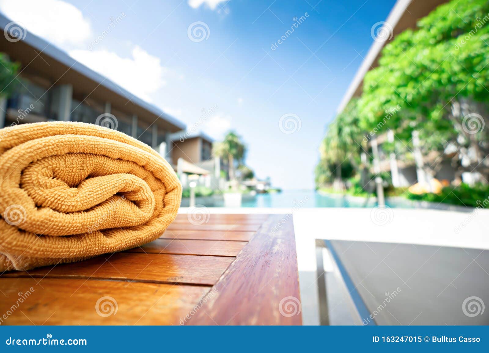 Yellow Towel Folded at the Pool Stock Image - Image of accommodation ...