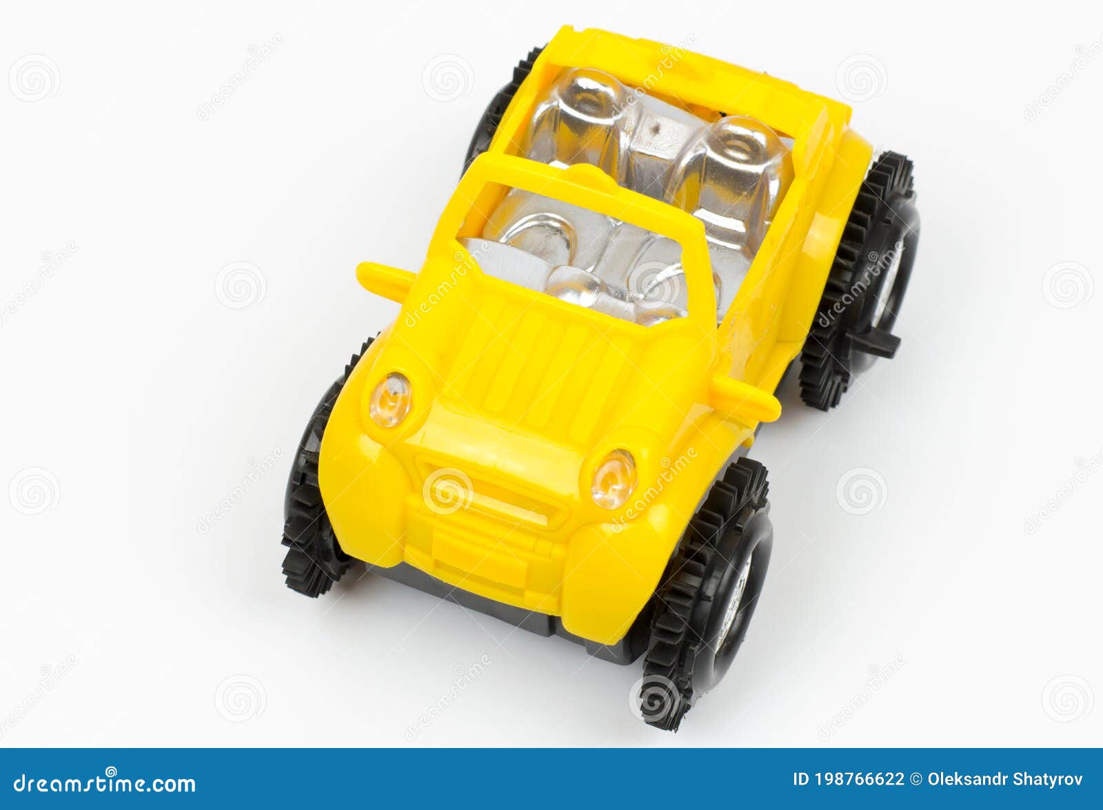 A Yellow Toy Car with Large Black Wheels Stock Photo - Image of ...