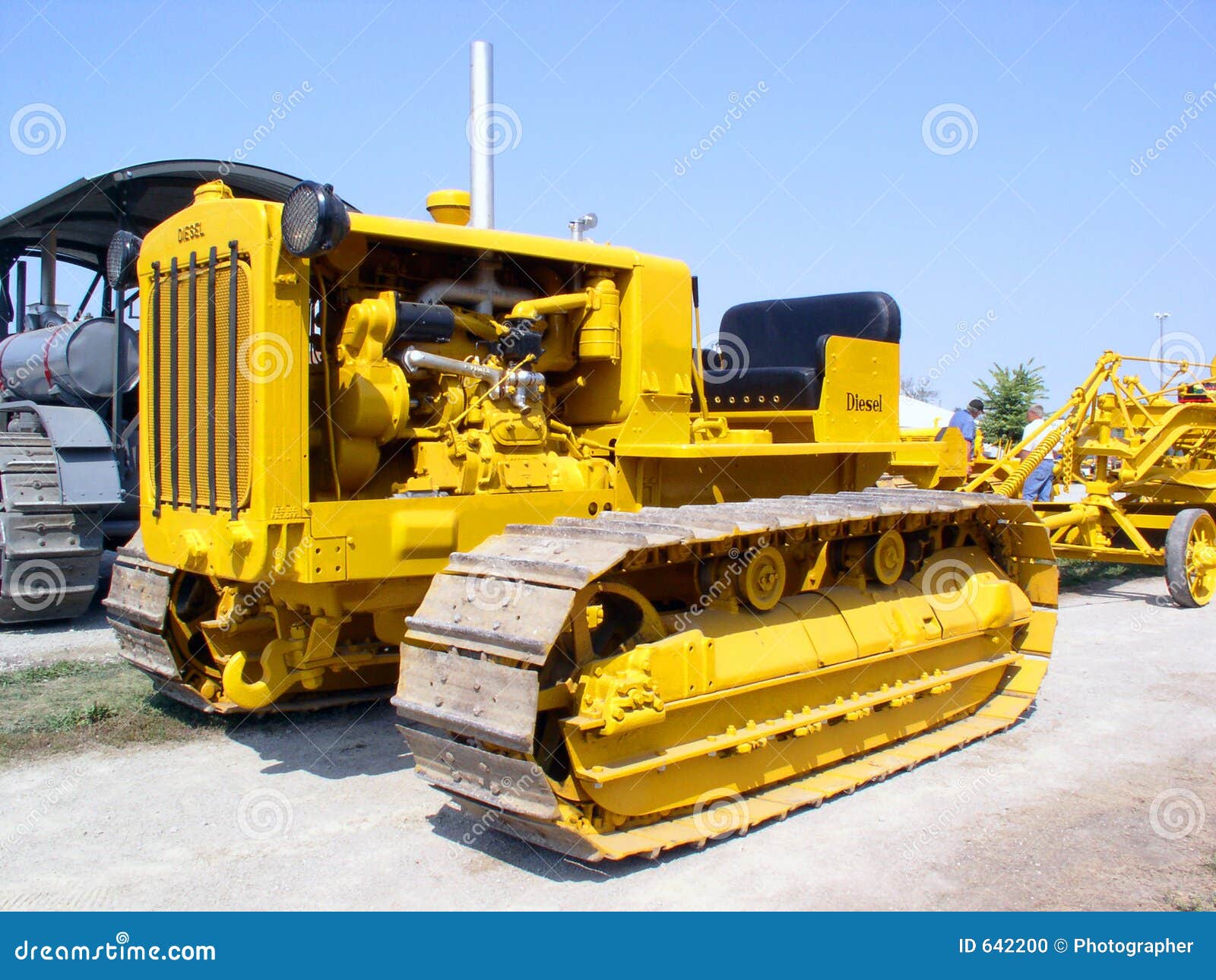 Yellow Tractor stock photo. Image of outdoors, tractor - 642200