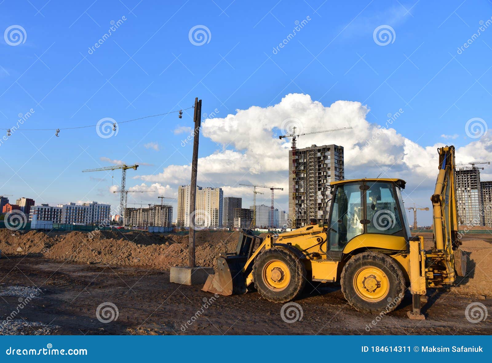 Yellow Tractor with Bucket at Construction Site Stock Image - Image of ...
