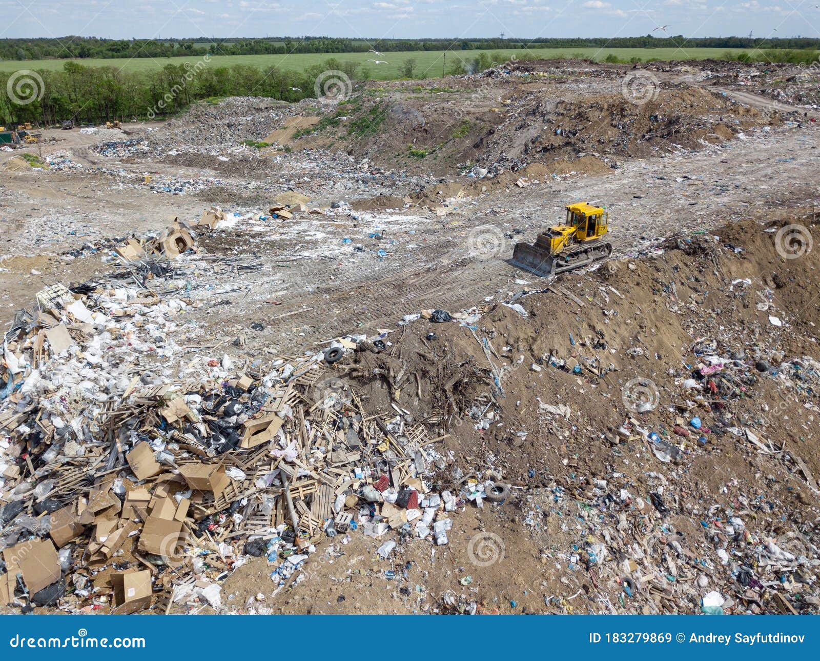 Yellow Tractor on Dump. Garbage Collection, Environmental Disaster ...