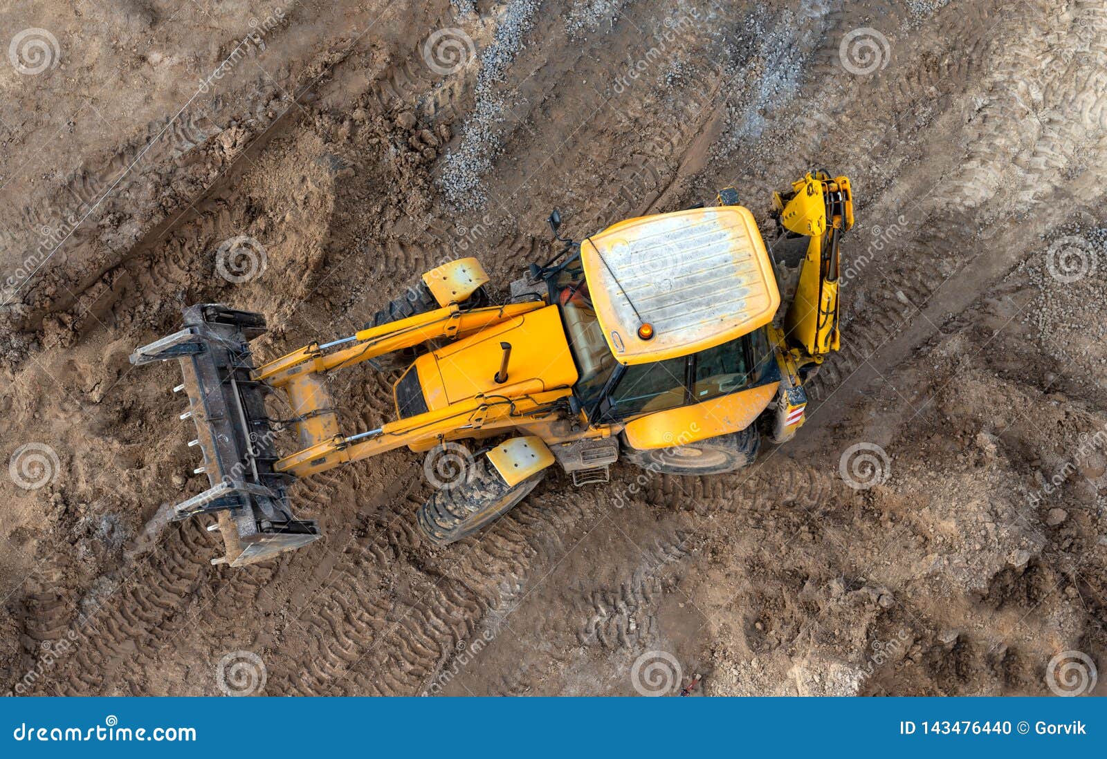 Yellow tractor - top view stock photo. Image of alignment - 143476440
