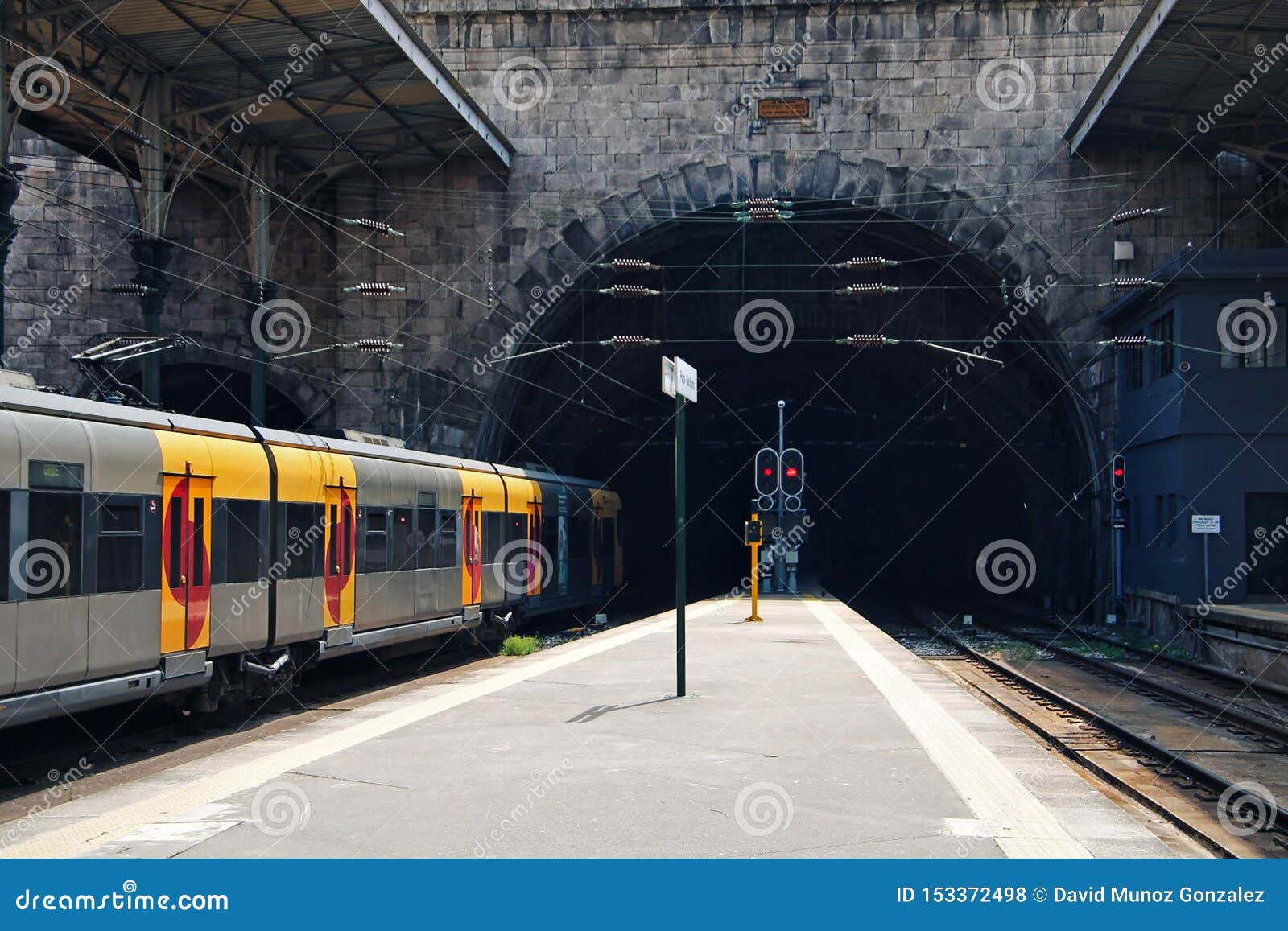 Yellow Train Leaving the Station. Editorial Stock Photo - Image of ...