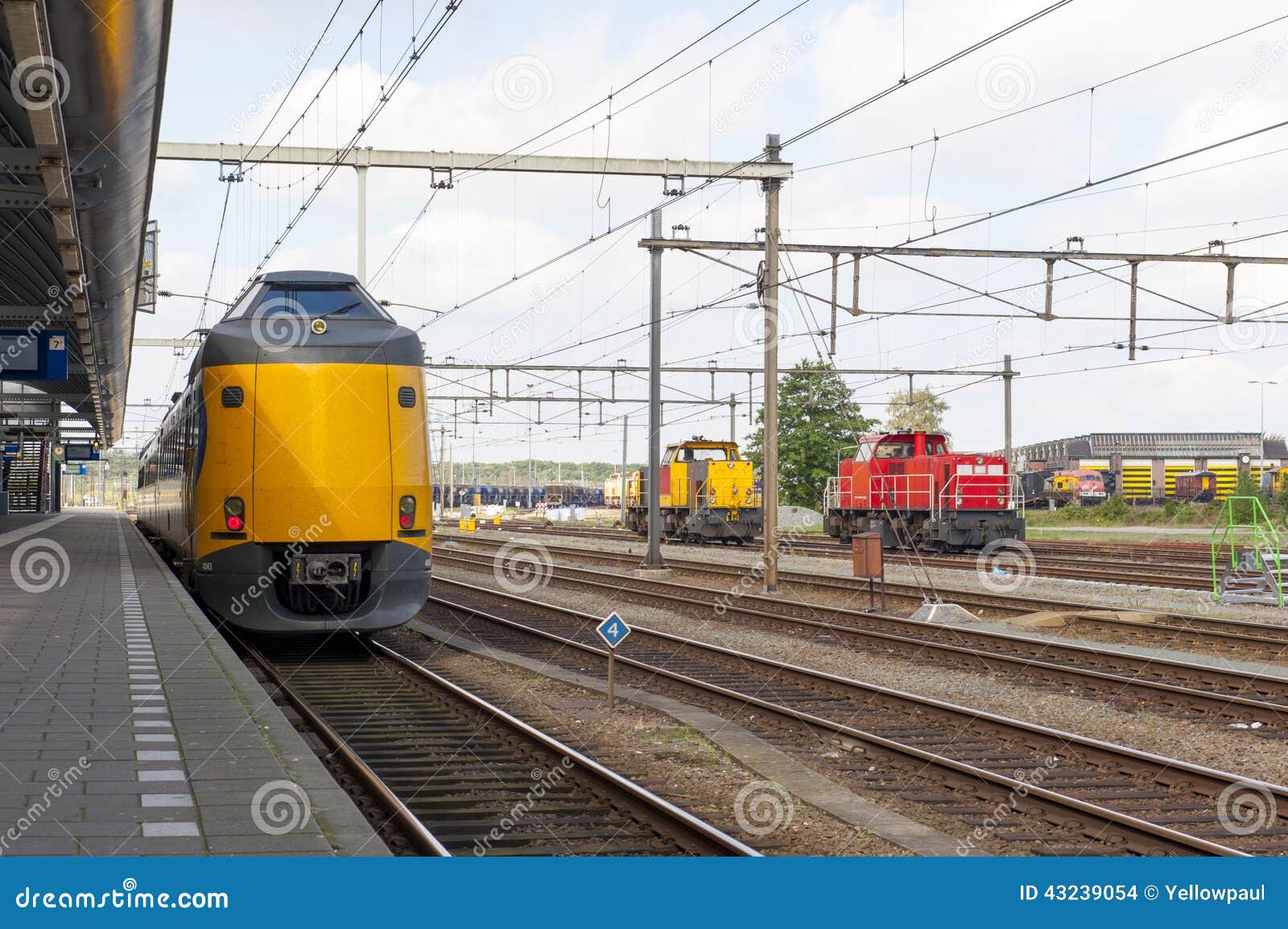 Yellow Train at Platform of Train Station Editorial Stock Image - Image ...