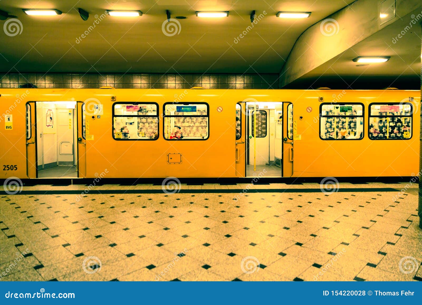 A Yellow Train of the Subway in Berlin Stock Photo - Image of color ...