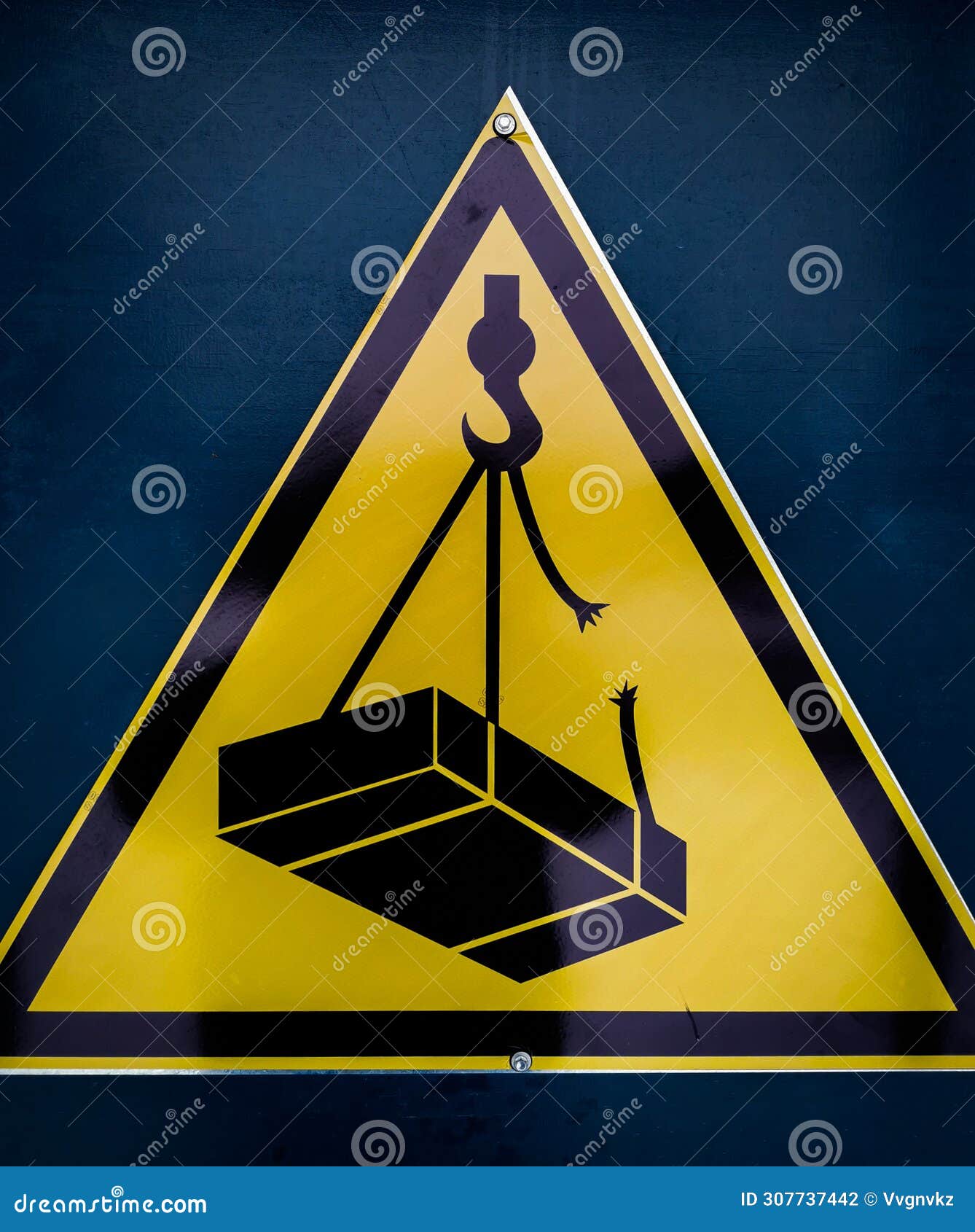 Yellow Triangle Warning Sign on a Blue Background with a Crane and a ...