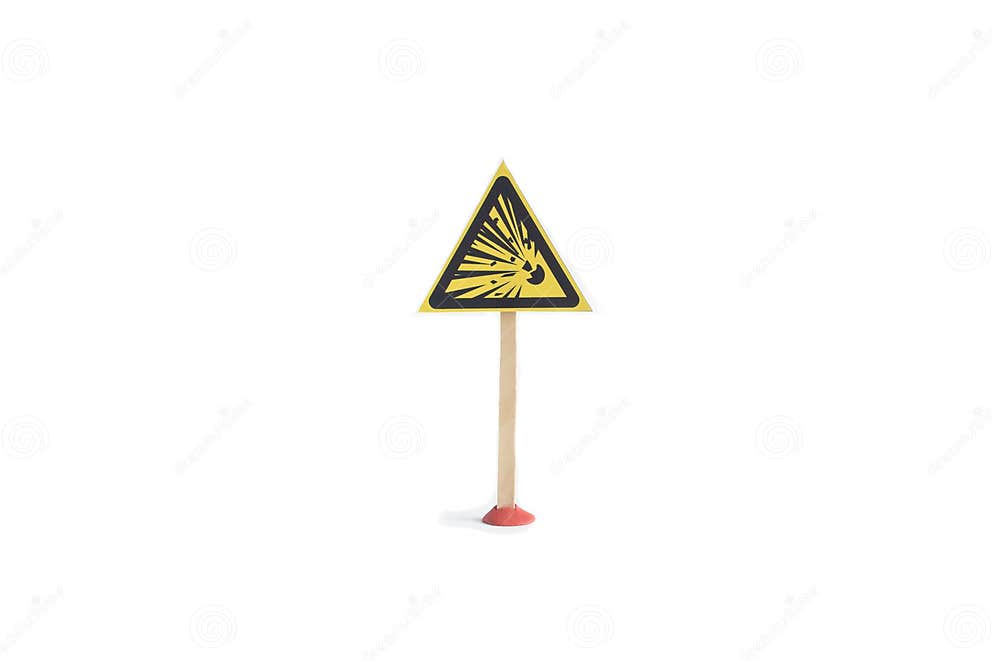Yellow Triangular Warning Sign with Flying Stones in Close-up on a ...