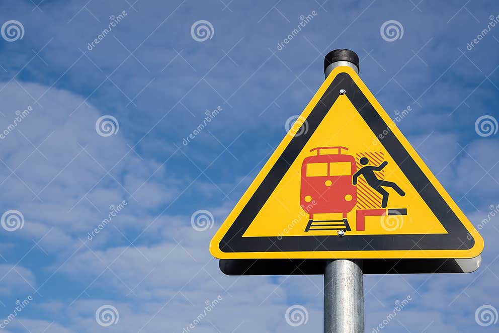 Yellow Triangular Warning Sign for Passengers on a Platform Meaning ...