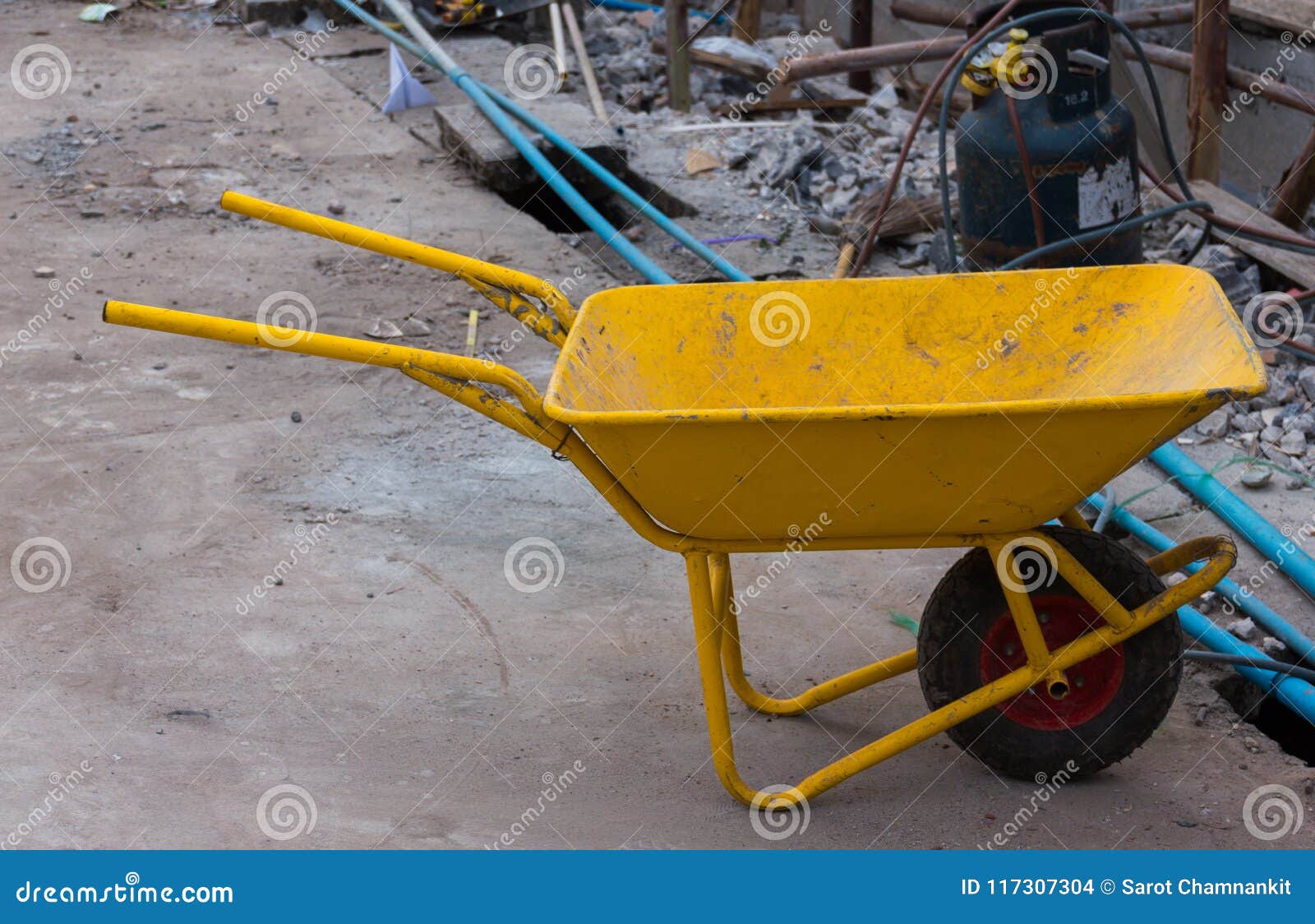 Yellow Trolley for Construction. Stock Photo - Image of dirty, nature ...