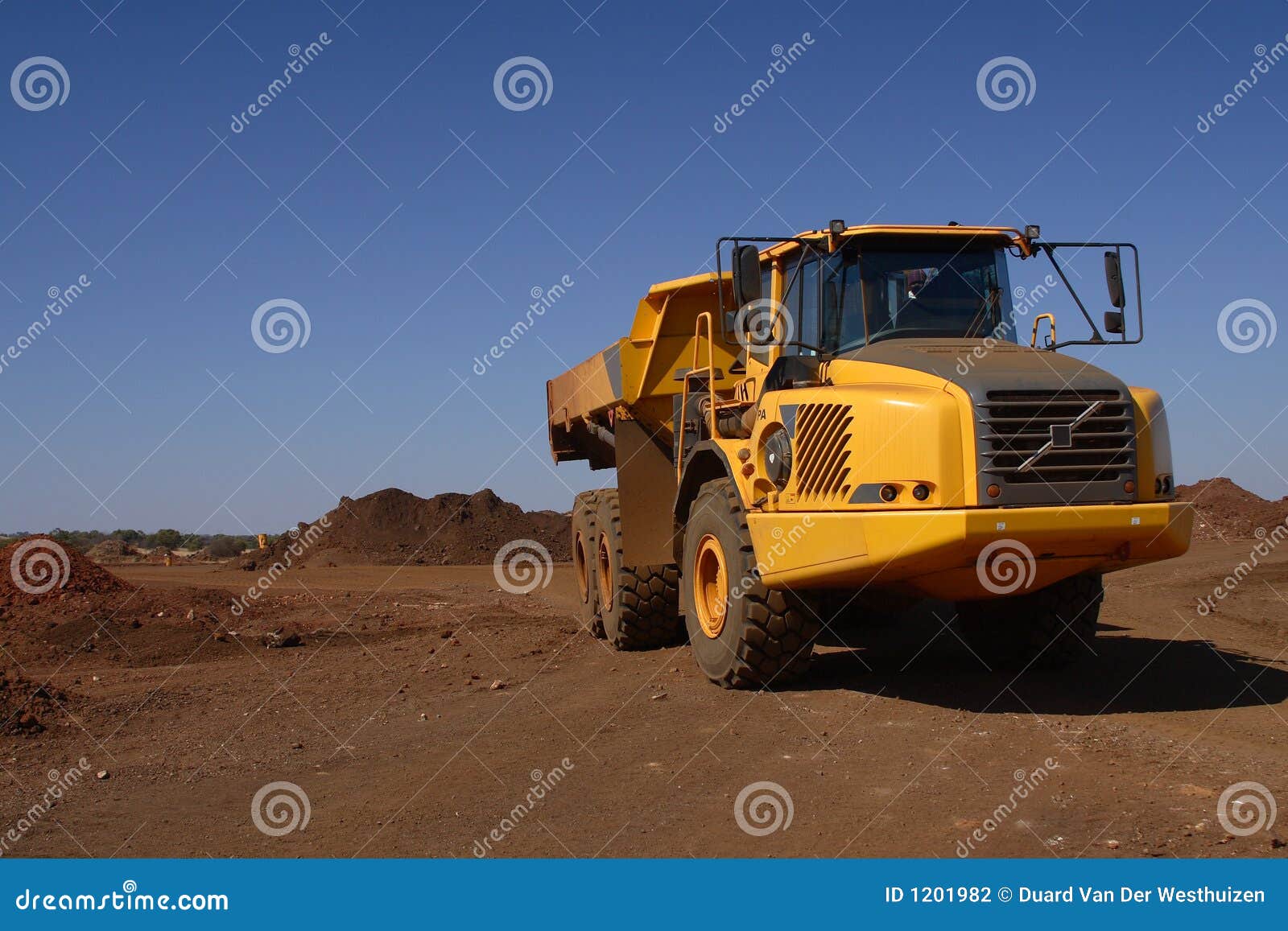 Yellow Truck On A Lift In A Car Service. Servicing And Repairing Trucks ...