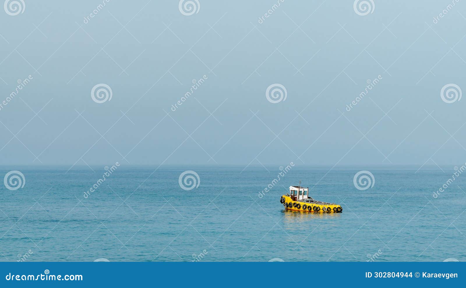 Yellow Tugboat in the Mediterranean Sea. Minimal Background Stock Photo ...