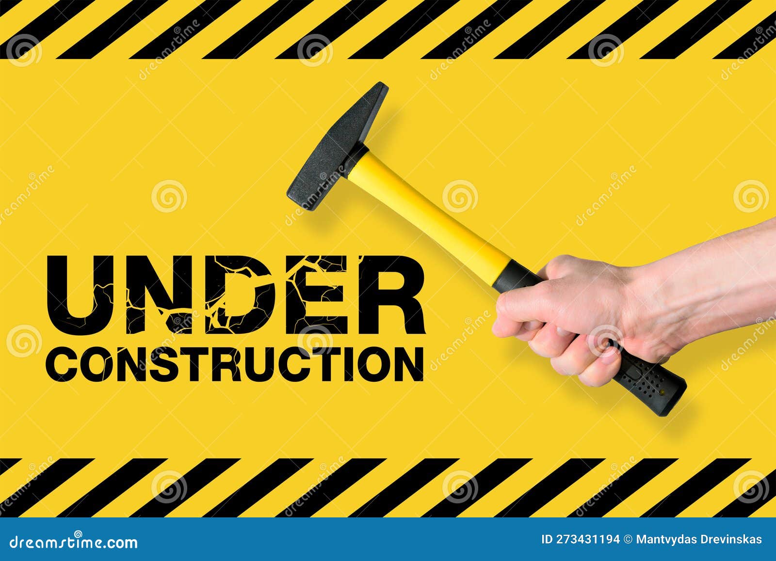 Yellow Under Construction Cracked Sign with Hammer in Human Hand Stock ...