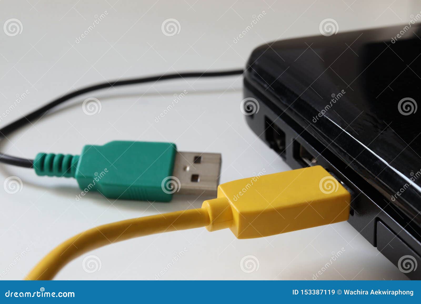 USB Cable Connect To Laptop Computer on White Background Stock Image ...