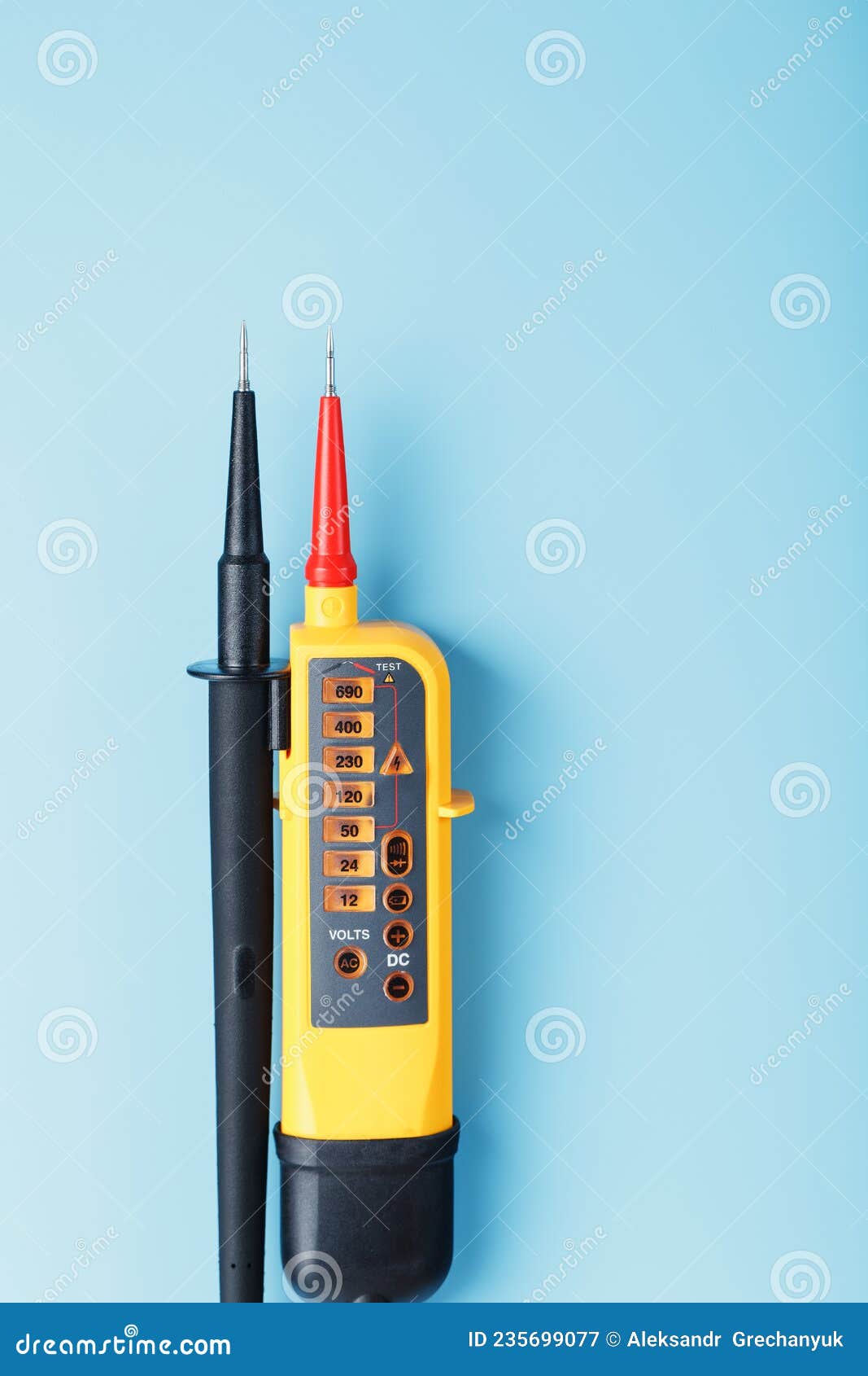 Two-pole Voltage Indicator Close-up on a Blue Background. Stock Image ...