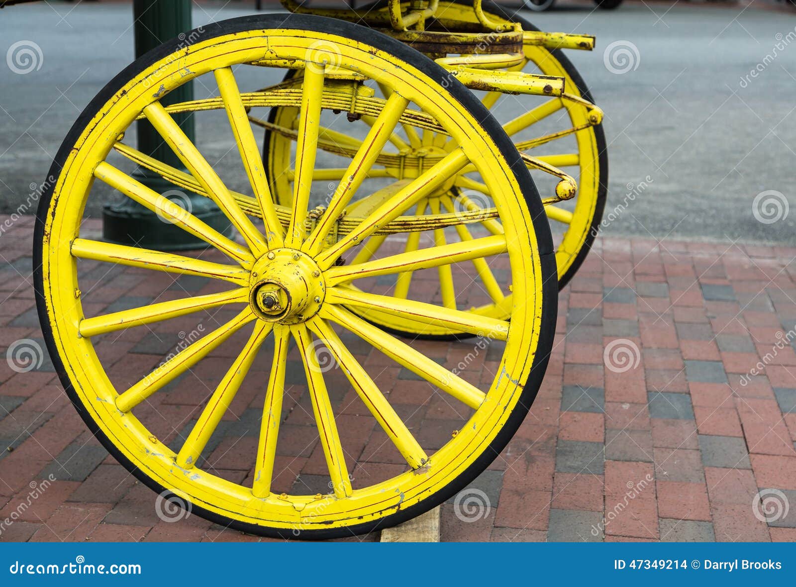 Yellow Wagon Wheel stock photo. Image of round, rusty - 47349214