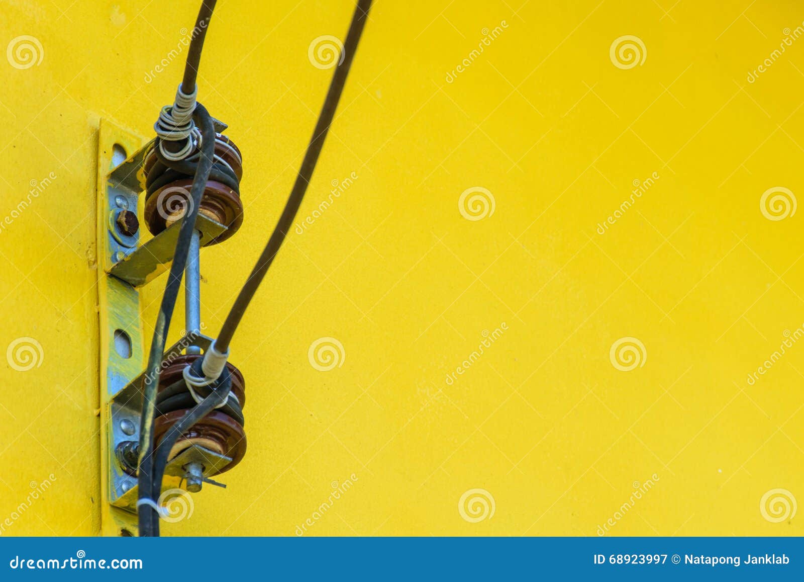 Yellow wall cable stock image. Image of building, light - 68923997