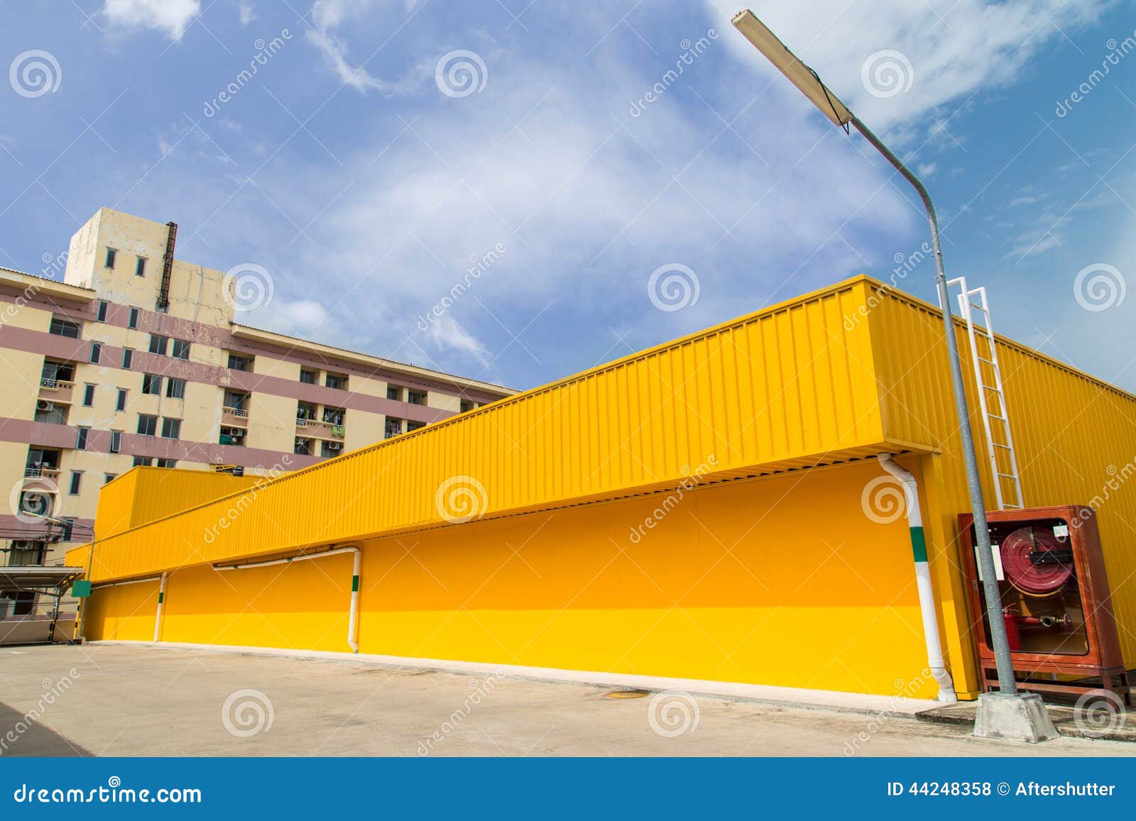 Yellow Warehouse Buliding stock photo. Image of front - 44248358